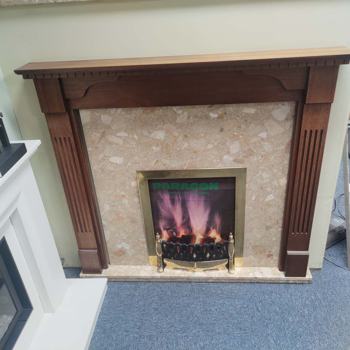 Joanne Surround + Marfil Back Panel & Hearth - Victoria House Fireplaces • Ignite Your Imagination